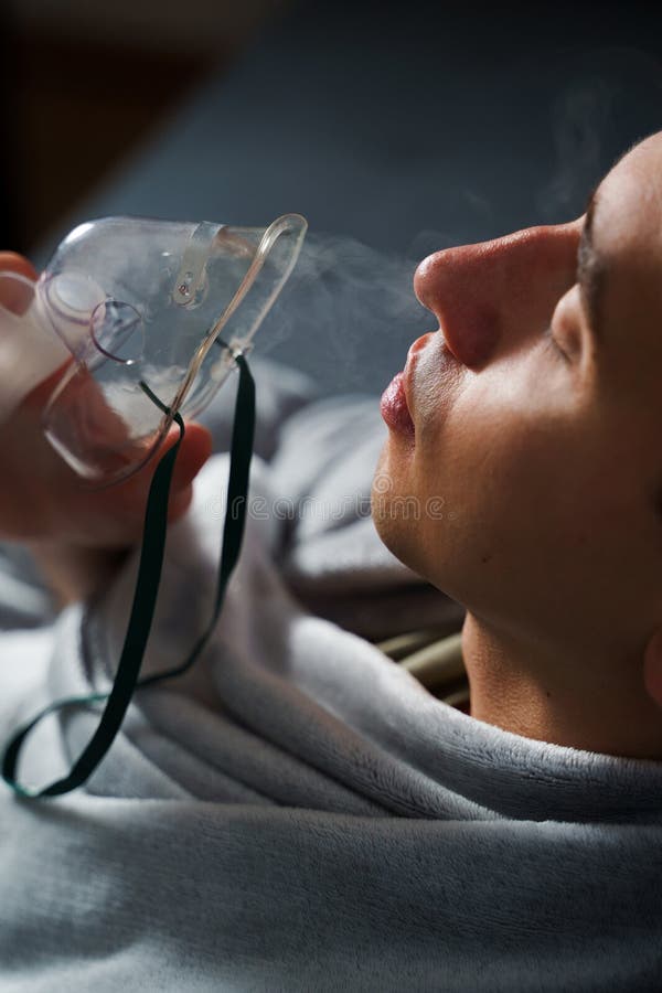 Using Compressor Nebulizer for Disease Treatment at Home. Man Inhaling ...