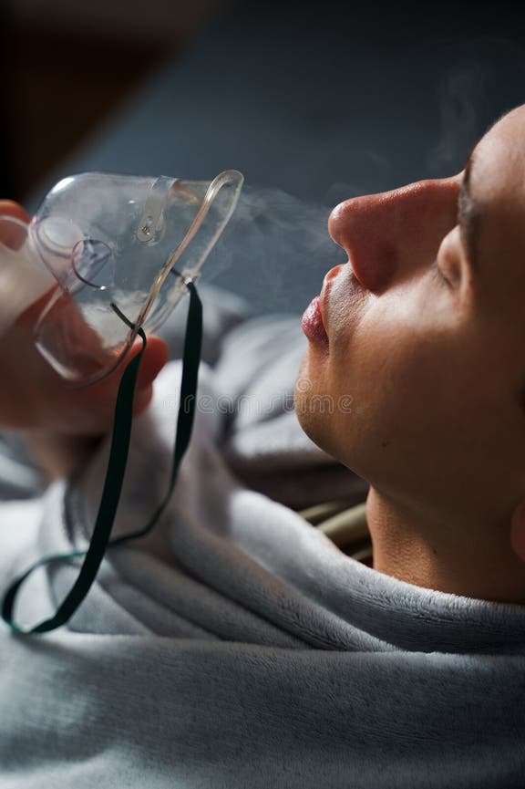 Using Compressor Nebulizer for Disease Treatment at Home. Man Inhaling ...