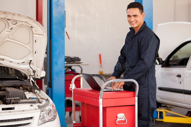 Using a Computer at an Auto Shop Stock Photo - Image of contact ...