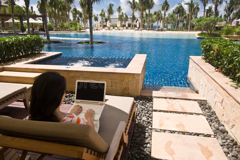 Using Computer at Hotel Lagoon Room Stock Photo - Image of side ...