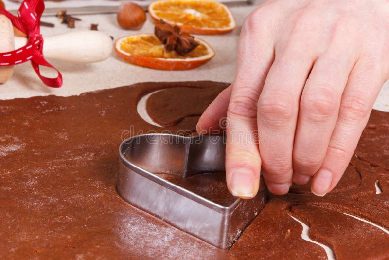 Using Cookie Cutters and Dough for Baking Festive Cookies or ...