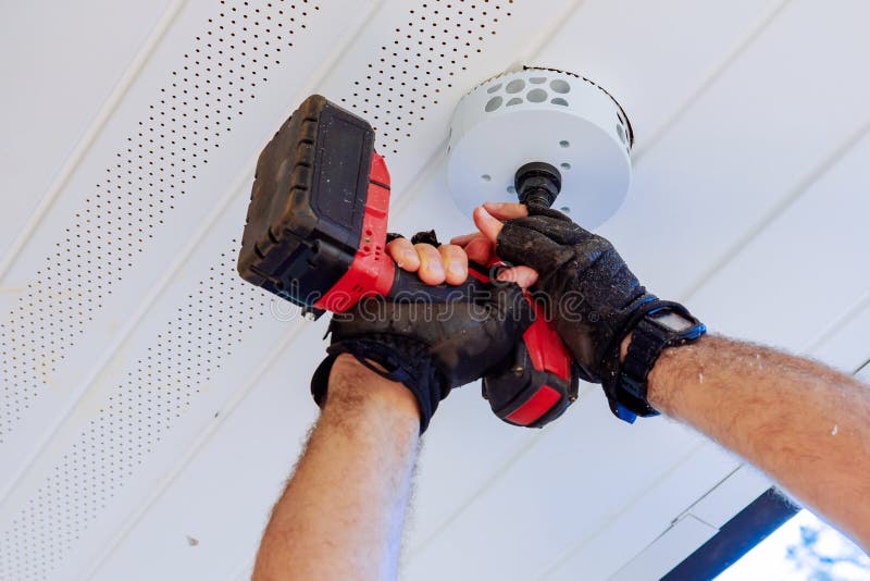 Using Cordless Drill with Hole Saw Attachment, Gloved Hand Cuts ...