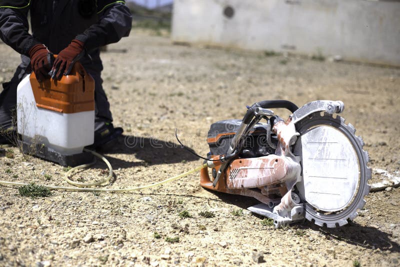 Using cutting machines stock photo. Image of hand, dust - 94088906