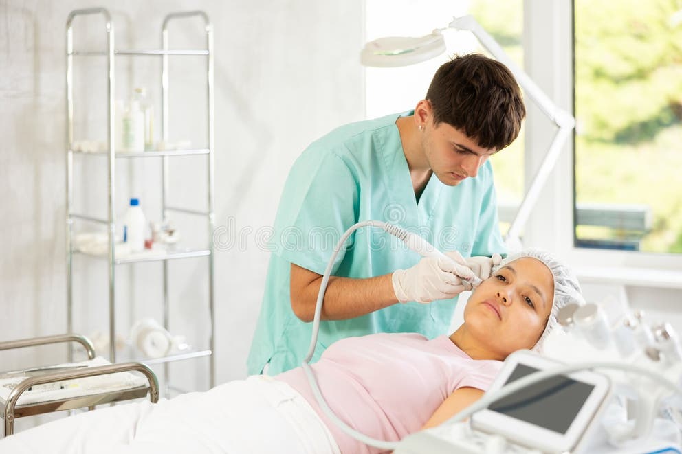 Using Device and Hydrogen Oxygen Cleaning Attachment Stock Photo ...