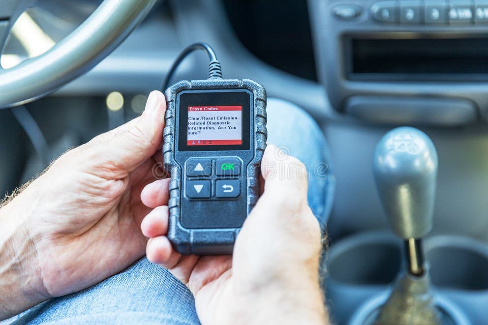 Using Diagnostic Car Code Reader To Erase Error Codes Stock Photo ...