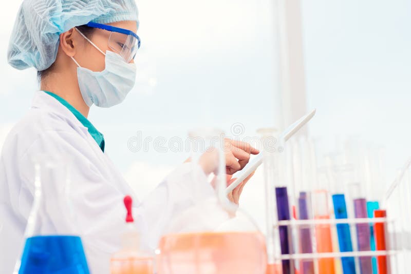 Using digital tablet stock image. Image of glasses, chemical - 44216737