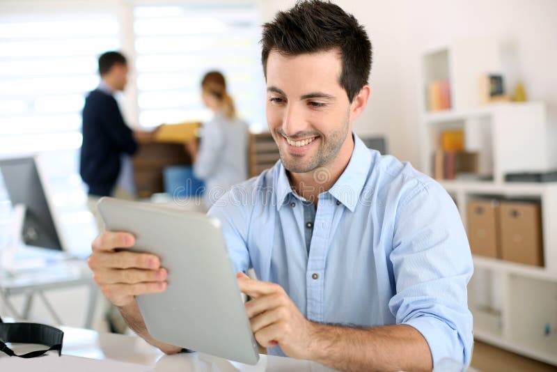 Using Digital Tablet for Work Stock Photo - Image of tablet, smiling ...