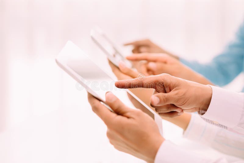 Using digital tablets stock image. Image of device, manager - 47344101