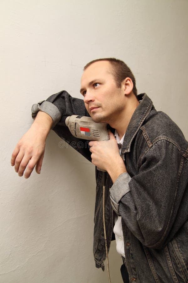 Using drill. Make repairs stock image. Image of clothing - 11297295