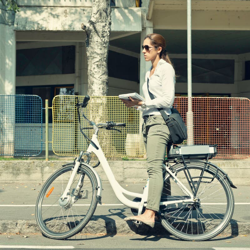 Using E-bike To Get To Work Stock Photo - Image of green, resources ...