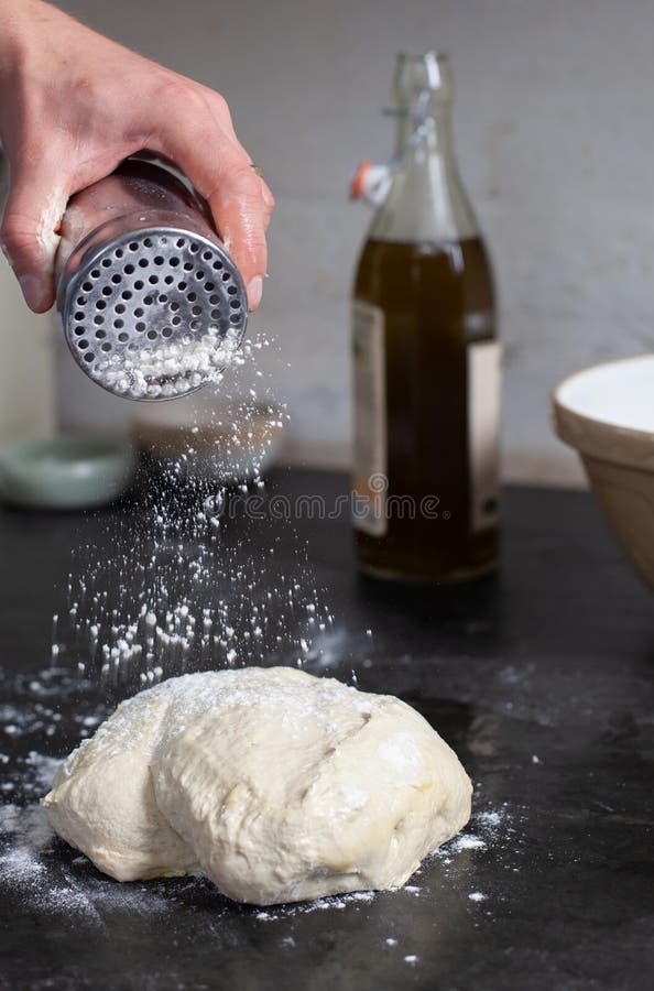 Using a Flour Shaker in Bread Making Stock Image - Image of loaf ...