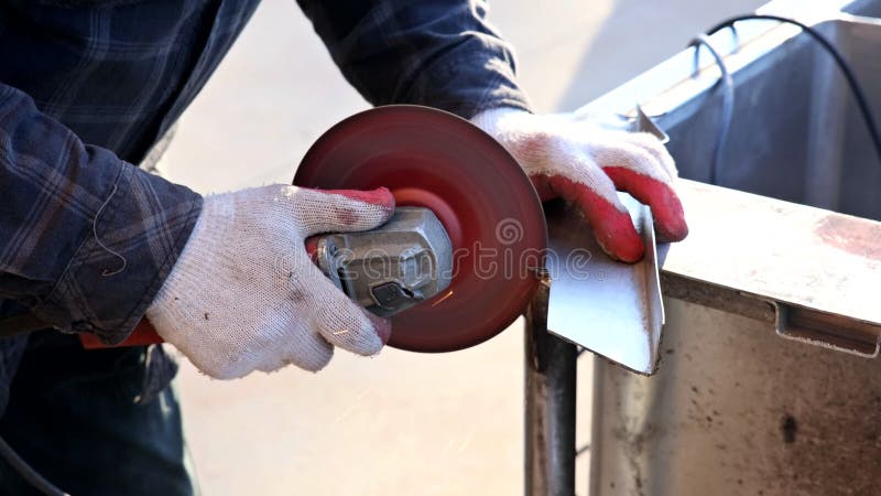Using a Grinding Iron, the Worker Polished the Metal Surfaces Stock ...