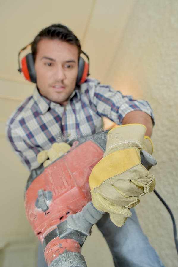 Using Hammer Drill on Floor Stock Image - Image of pneumatic, drilling ...