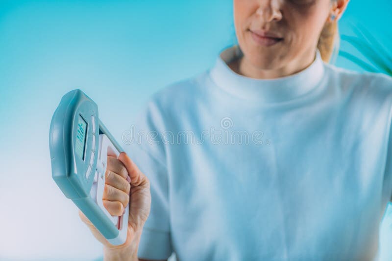 Using Hand Dynamometer. Entering Values into Smart Phone App Stock ...