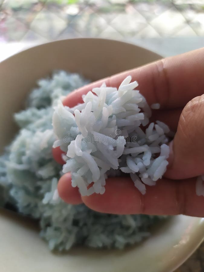 Using a Hand To Scoop Rice To Eat Stock Photo - Image of hand, rice ...