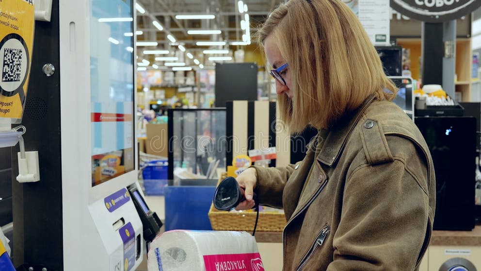 Using Handheld Barcode Scanner at Self Service Checkout Counter in ...