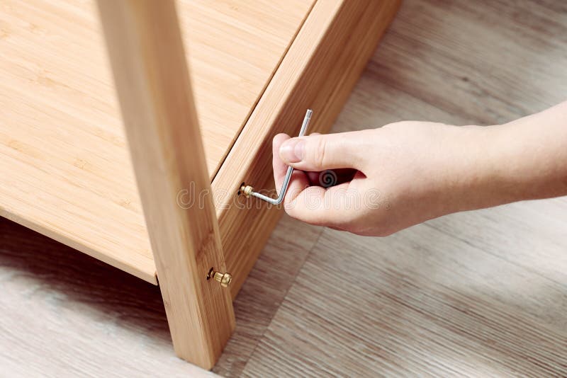 Using Hex Key when Assembling Flat Pack Furniture. Stock Photo - Image ...
