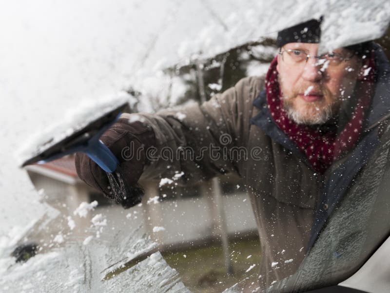 Using the Ice Scraper stock photo. Image of freeze, outdoor - 55678442