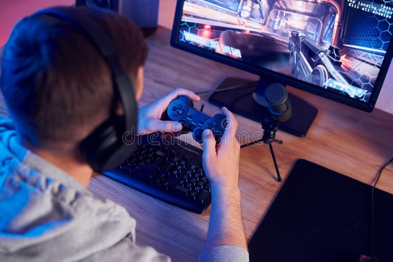 Using the Joystick. Online Streamer Playing FPS Shooter Game at Home ...