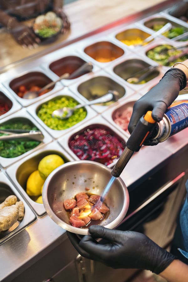 Using Kitchen Blowtorch stock photo. Image of adding - 257575550