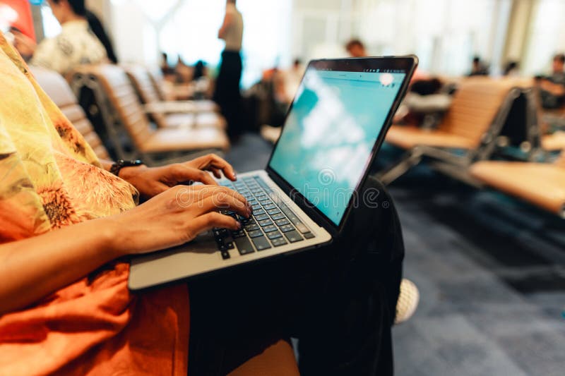 Using a Laptop at the Airport Stock Photo - Image of trip, airline ...