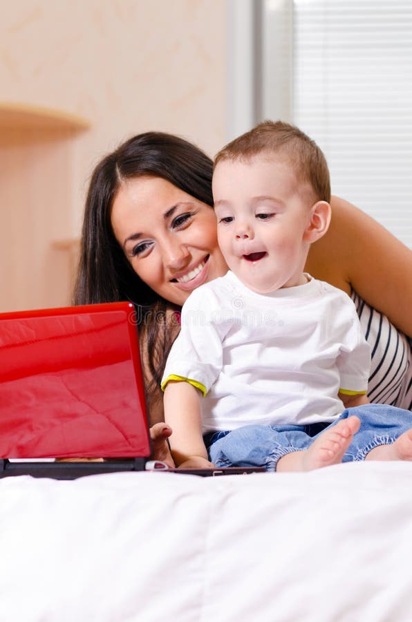 Using laptop at home stock photo. Image of love, flat - 21413762