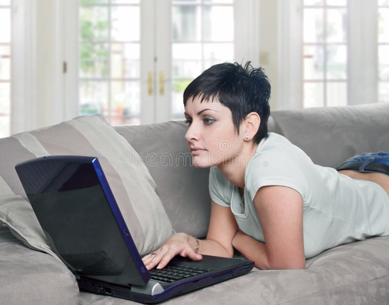 Using laptop at home stock image. Image of laptop, break - 2494611