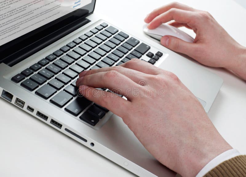 Using a laptop and mouse stock photo. Image of finger - 49433122