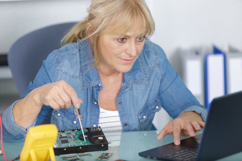 Using Laptop To Fix Computer Stock Photo - Image of sign, printer ...