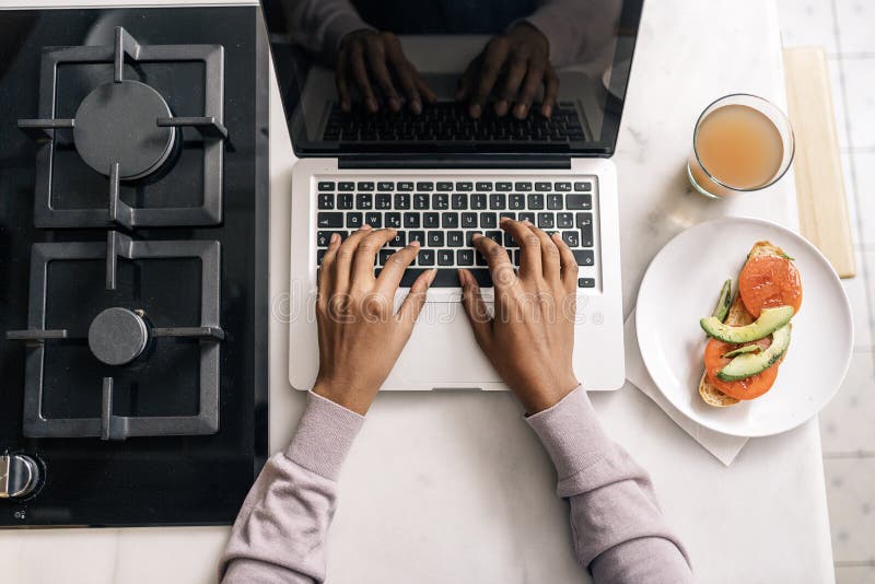 Using Laptop Top View stock photo. Image of laptop, breakfast - 251258526