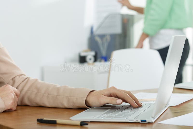 Using laptop at work stock photo. Image of manager, teamwork - 57982558