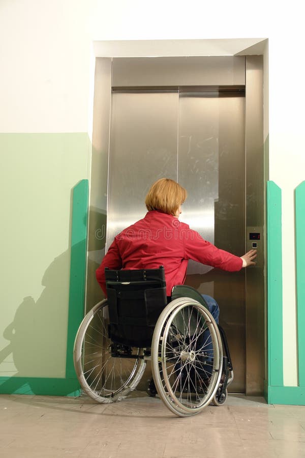 Handicapped using elevator stock image. Image of healthcare - 13888287