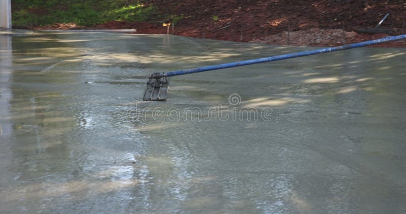 By Using a Long Trowel a Cement Concrete Leveling Tool, the Masonry ...