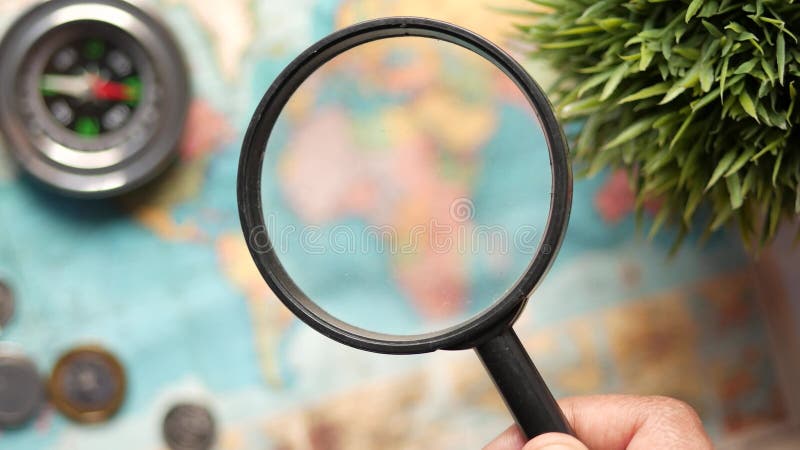 Using Magnifying Glass Looking Something on Map Stock Video - Video of ...