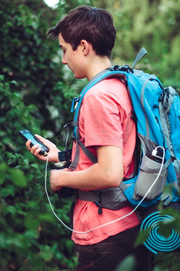 Using maps during the hike stock image. Image of mobile - 60843629