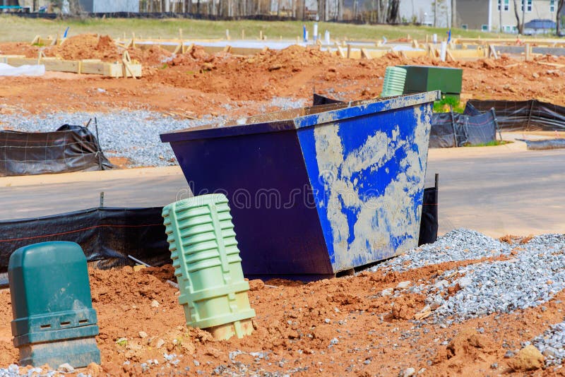 Using Metal Container Dumpster To Store Construction Waste at a ...