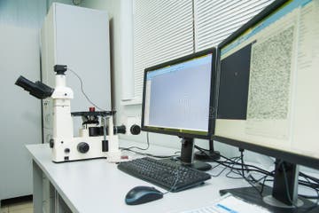 Using a Microscope To Check Metal Stock Image - Image of work ...