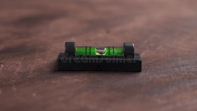 Using Mini Level Measurement Tool on a Board Stock Footage - Video of ...