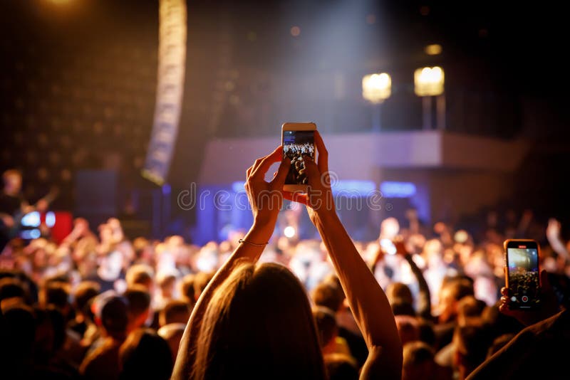 Using a Mobile Phone at the Concert. Editorial Stock Image - Image of ...