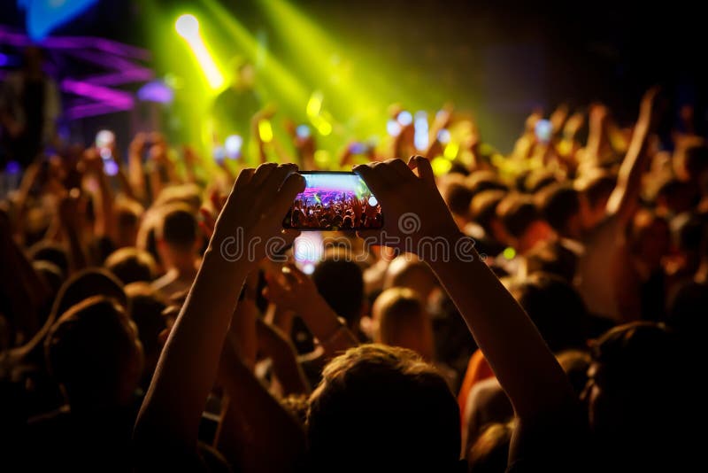 Using a Mobile Phone at the Concert. Editorial Image - Image of person ...