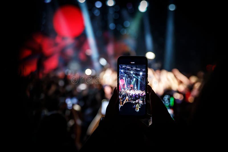 Using a Mobile Phone at the Concert. Stock Image - Image of live, cell ...