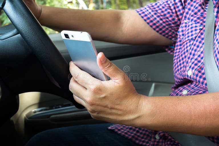 Using Mobile Phone while Driving Stock Image - Image of city ...