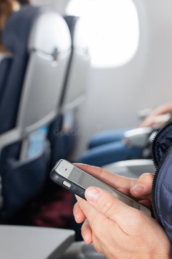 Using a Mobile Phone during the Flight Stock Image - Image of tablet ...