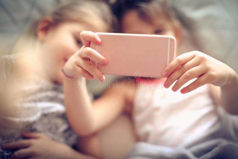 Using mobile together. stock photo. Image of happiness - 119862194