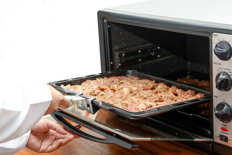 Using oven stock image. Image of utensil, button, kitchen - 53455127