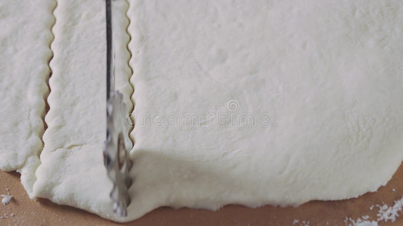 Using Pastry Wheel for Cutting Dough Stock Footage - Video of pastry ...