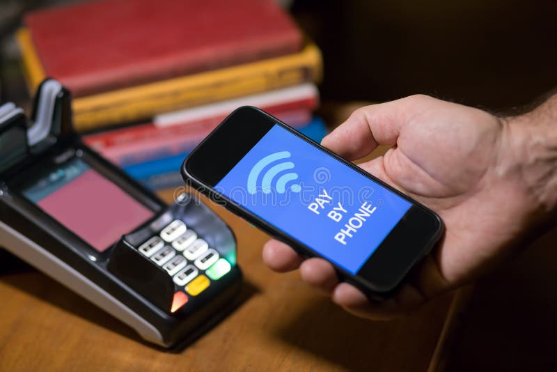Using Pay by Phone Service at Bookshop Stock Photo - Image of counter ...