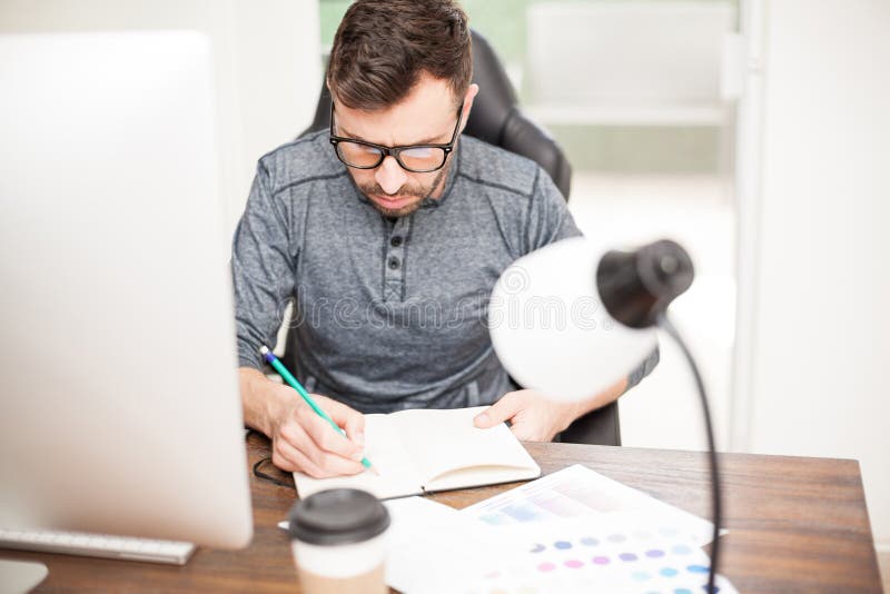 Using Pen and Paper To Draw a Sketch Stock Photo - Image of sketch ...