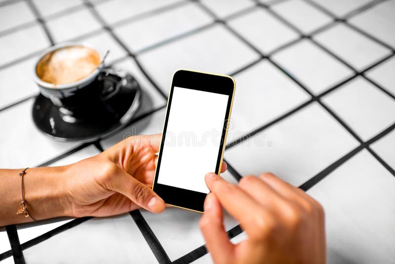 Using Phone with Coffee on Background Stock Image - Image of person ...