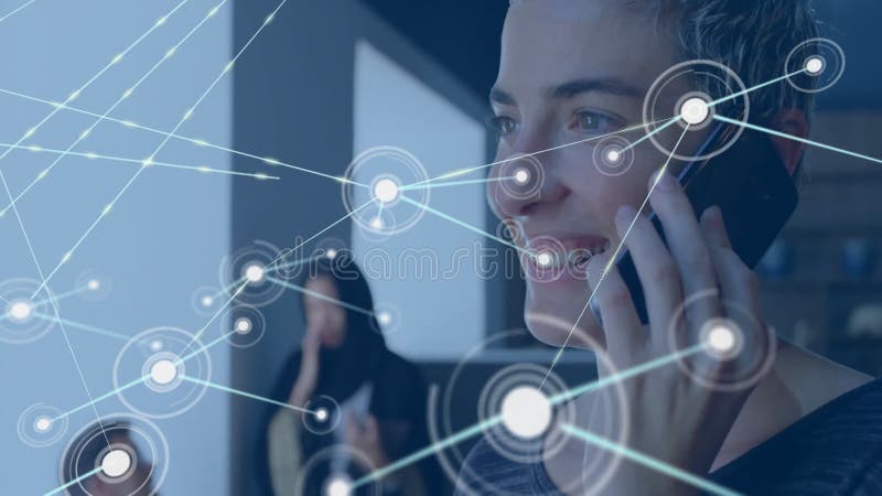 Using Phone with Digital Network Animation, Person Smiling in Office ...